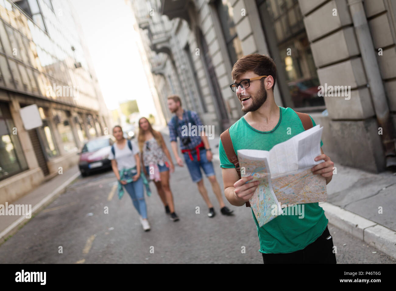 Happy tourists travelling and sightseeing Stock Photo - Alamy