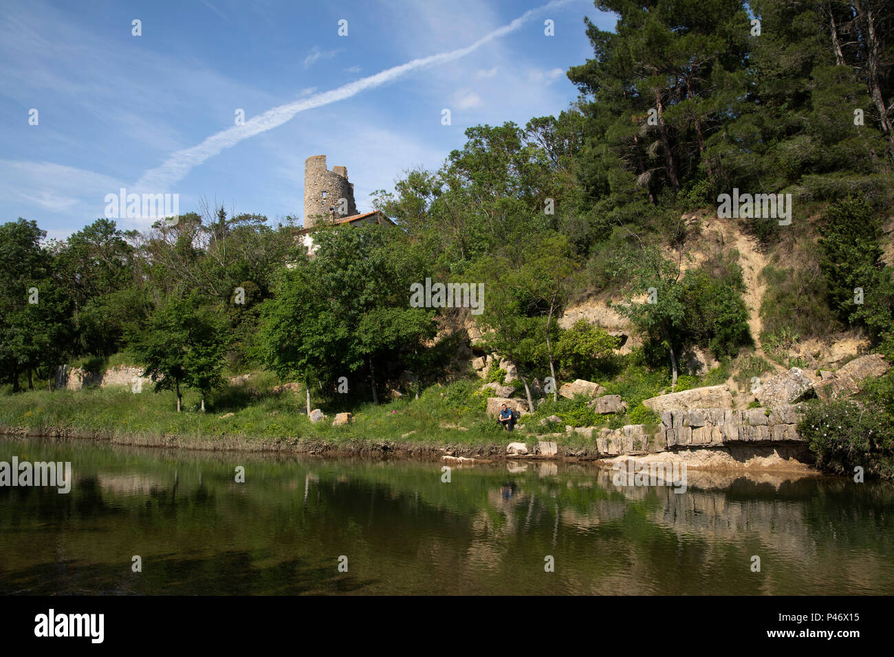 Scene along the river in the medieval village of Lagrasse, Languedoc ...