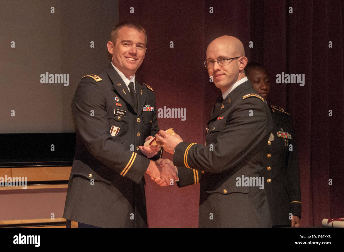 Capt. Jonathan P. Jeter (right), a native of Groves, Texas and graduate ...
