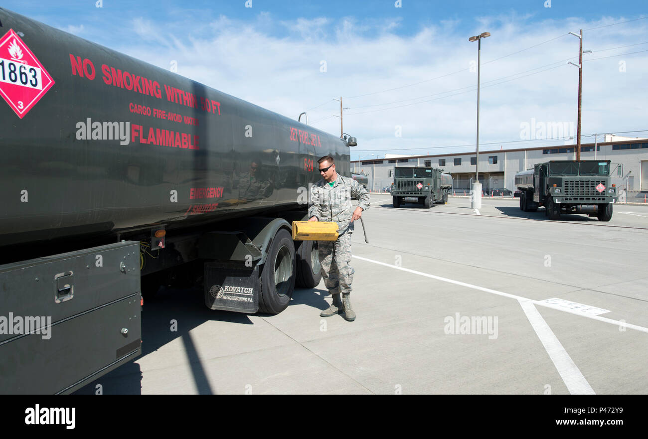 Airman First Class David Miley, fuels distribution operator, conducts a ...