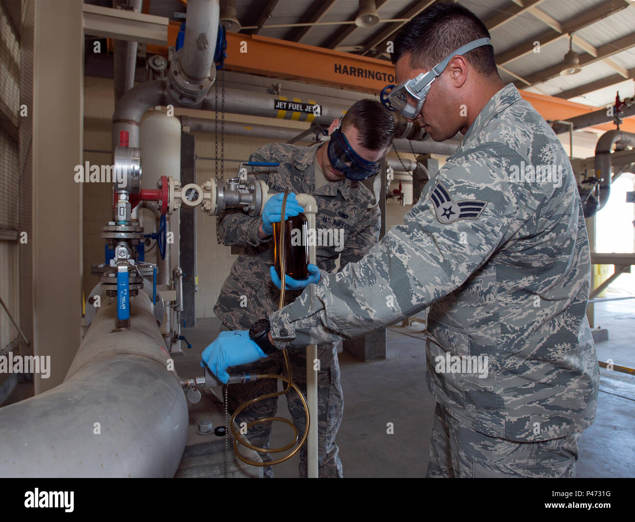 Airman Tanner O’Laughlin and Senior Airman Jeffery Bernacin, both fuels ...