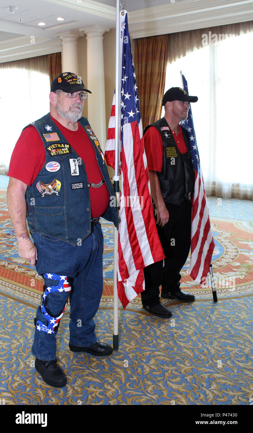 Patriot Guard Riders stand guard as all in attendance make their exit ...
