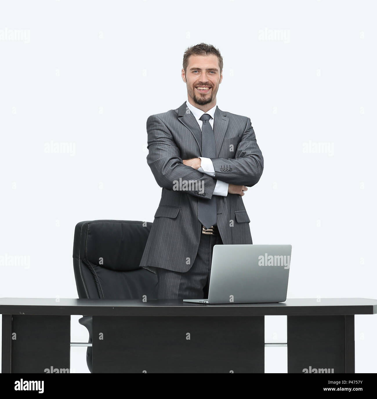 Boss sitting behind desk standing hi-res stock photography and images ...