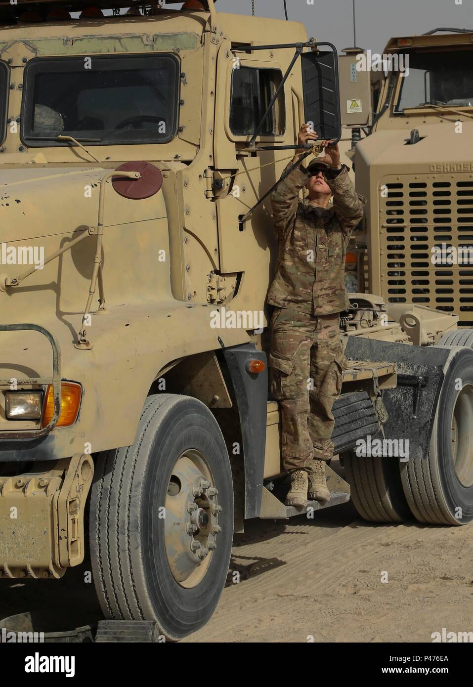 Pfc. Nicola Baker, a motor transport operator with the 109th ...