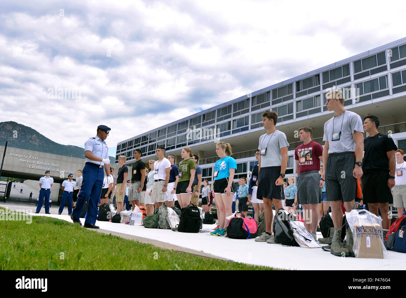A Basic Cadet Training cadre member gives basic cadets instructions on ...