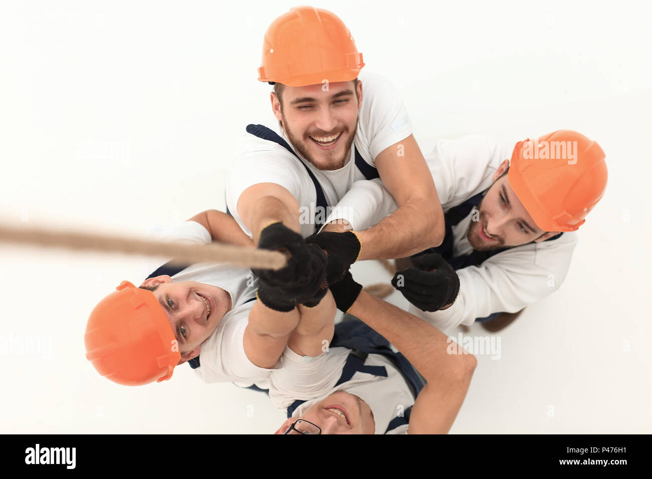 Construction worker pulling rope hi-res stock photography and images ...