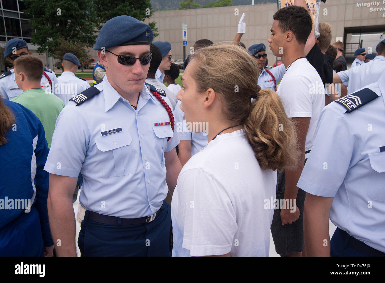Cadet 1st Class Brandon Kopp listens as basic cadet Hanna Born recites ...