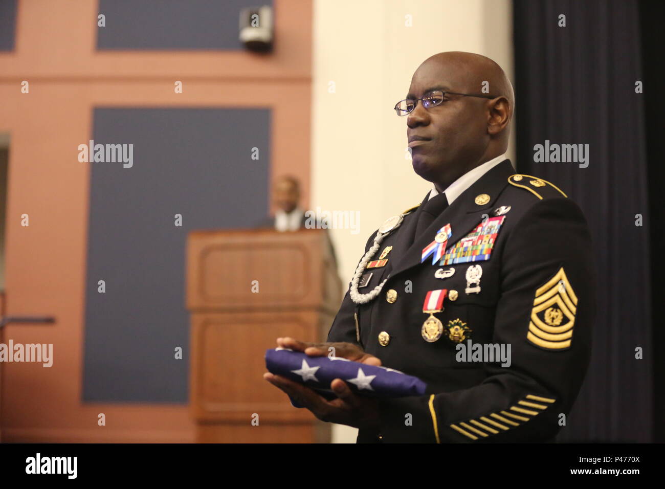 U.S. Army Command Sgt. Maj. Earl B. Allen participates in a U.S. Flag ...