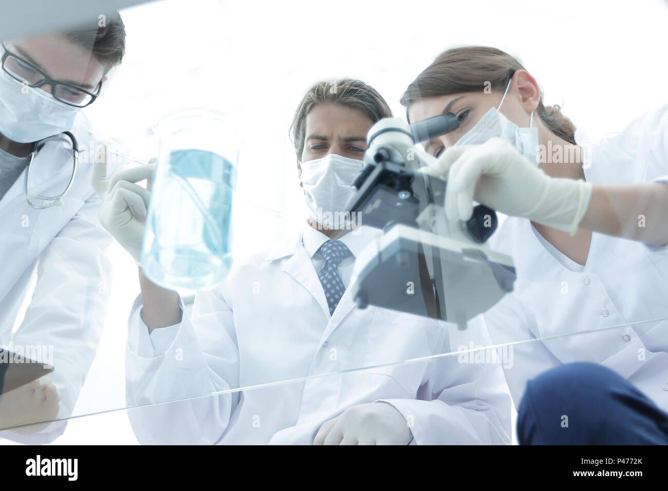 scientists conducting research in a lab environment Stock Photo - Alamy