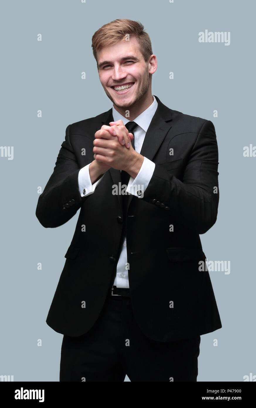 successful businessman making a welcoming gesture Stock Photo - Alamy