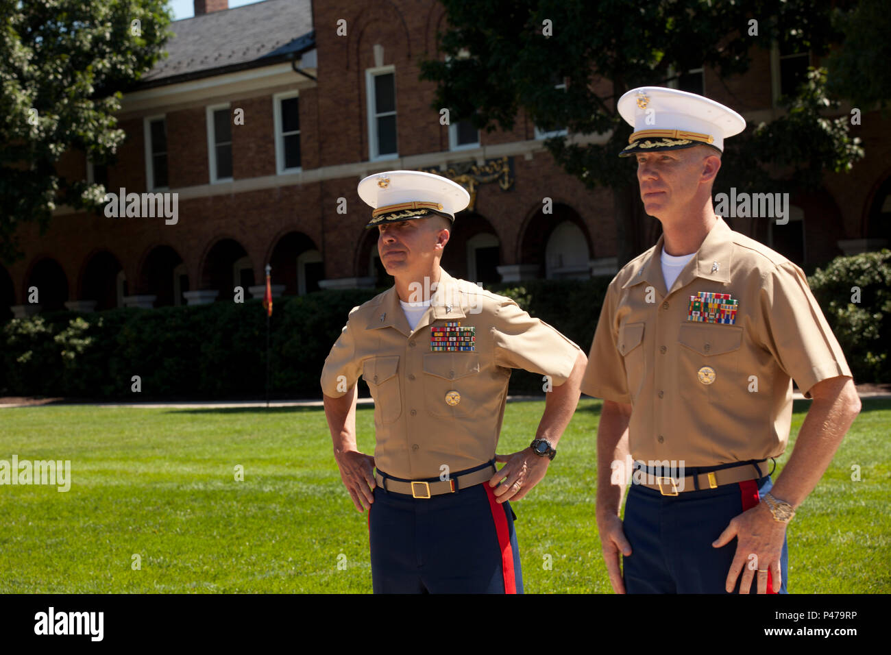 U.S. Marine Corps Col. Benjamin T. Watson, left, and Col. Tyler J ...