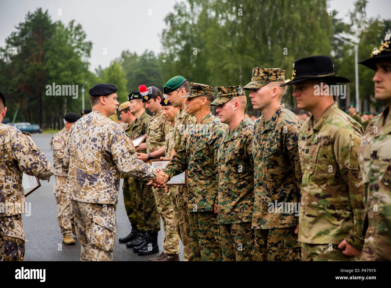 NATO allies shake hands to build and strengthen a lasting partnership ...