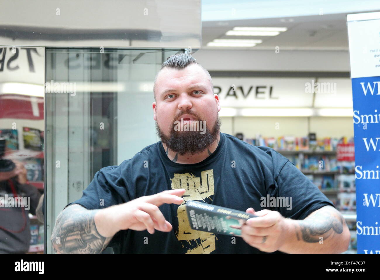 Eddie "The Beast" Hall signing copies of his book the Strongmen Huge in ...