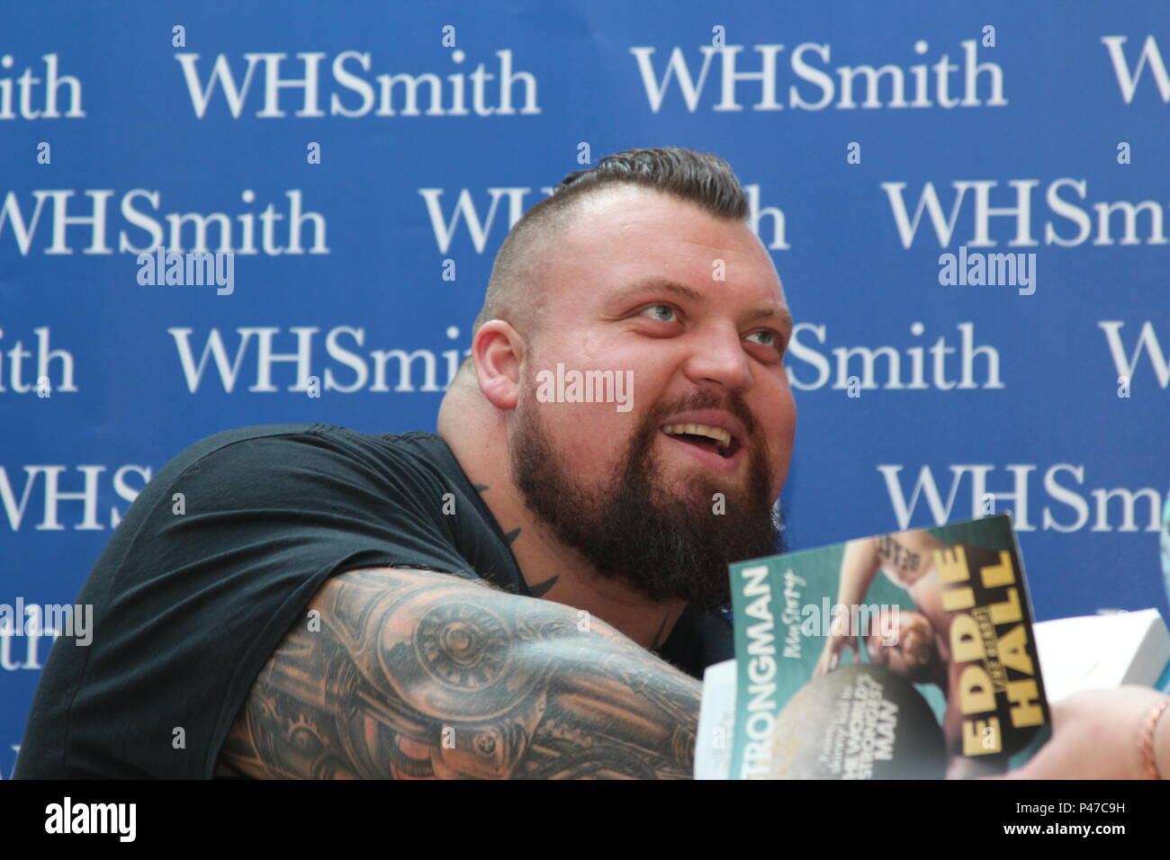 Eddie "The Beast" Hall signing copies of his book the Strongmen Huge in ...
