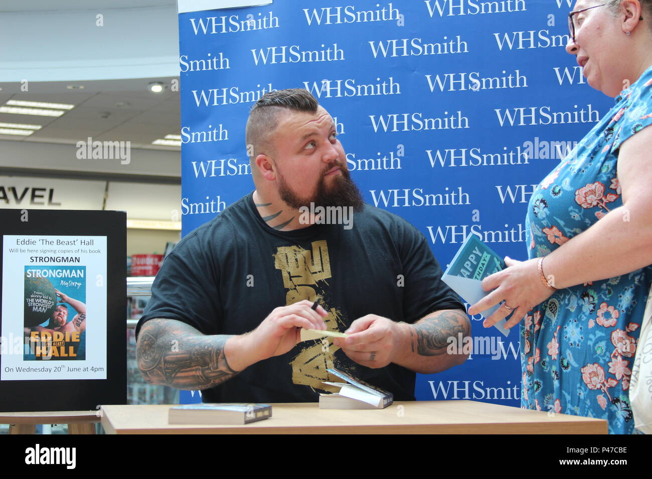 Eddie "The Beast" Hall signing copies of his book the Strongmen Huge in ...