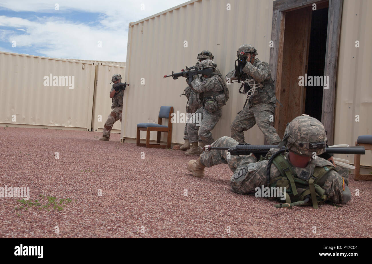 U.S. Army Soldiers of the 235th Military Police Company clear a ...