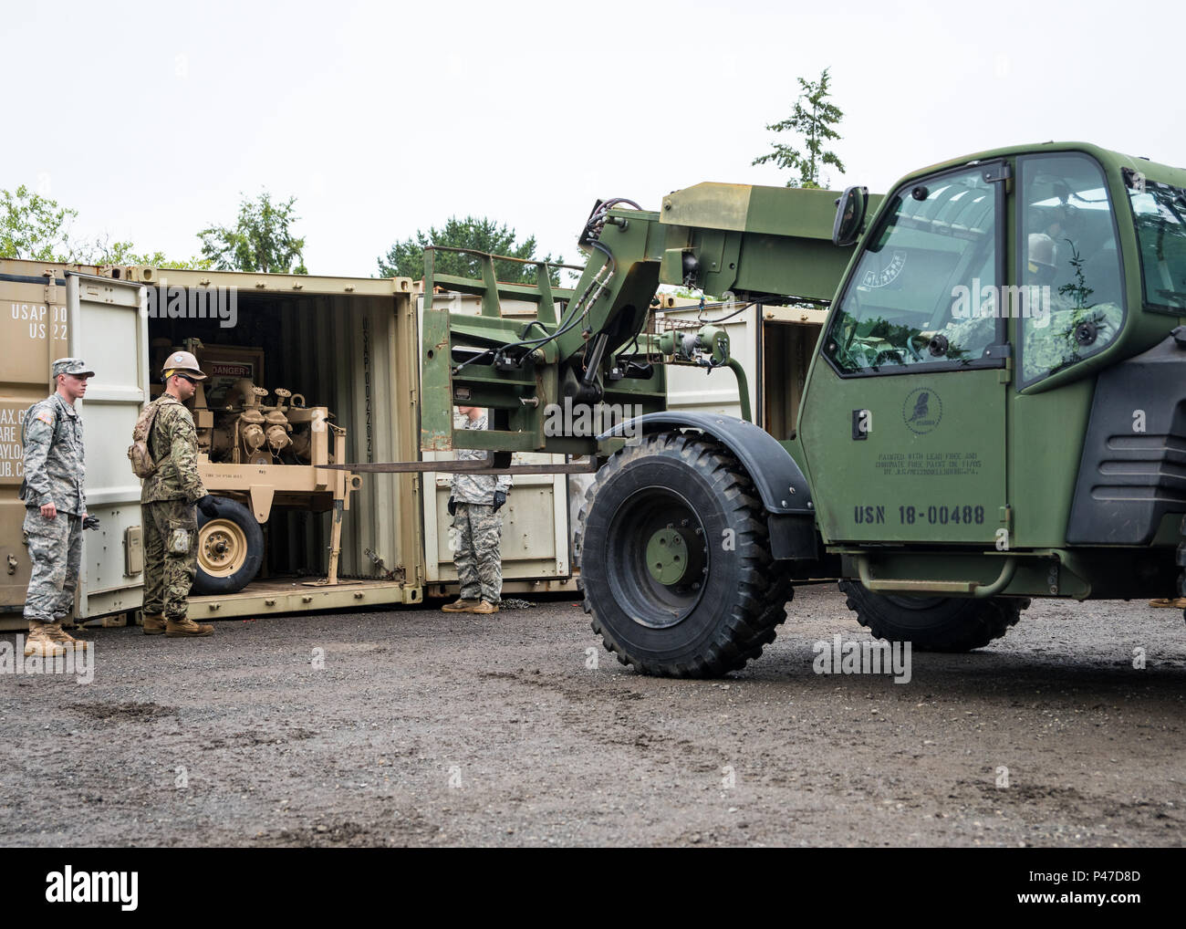 Seabees, attached to Amphibious Construction Battalion (ACB) 1, and U.S ...