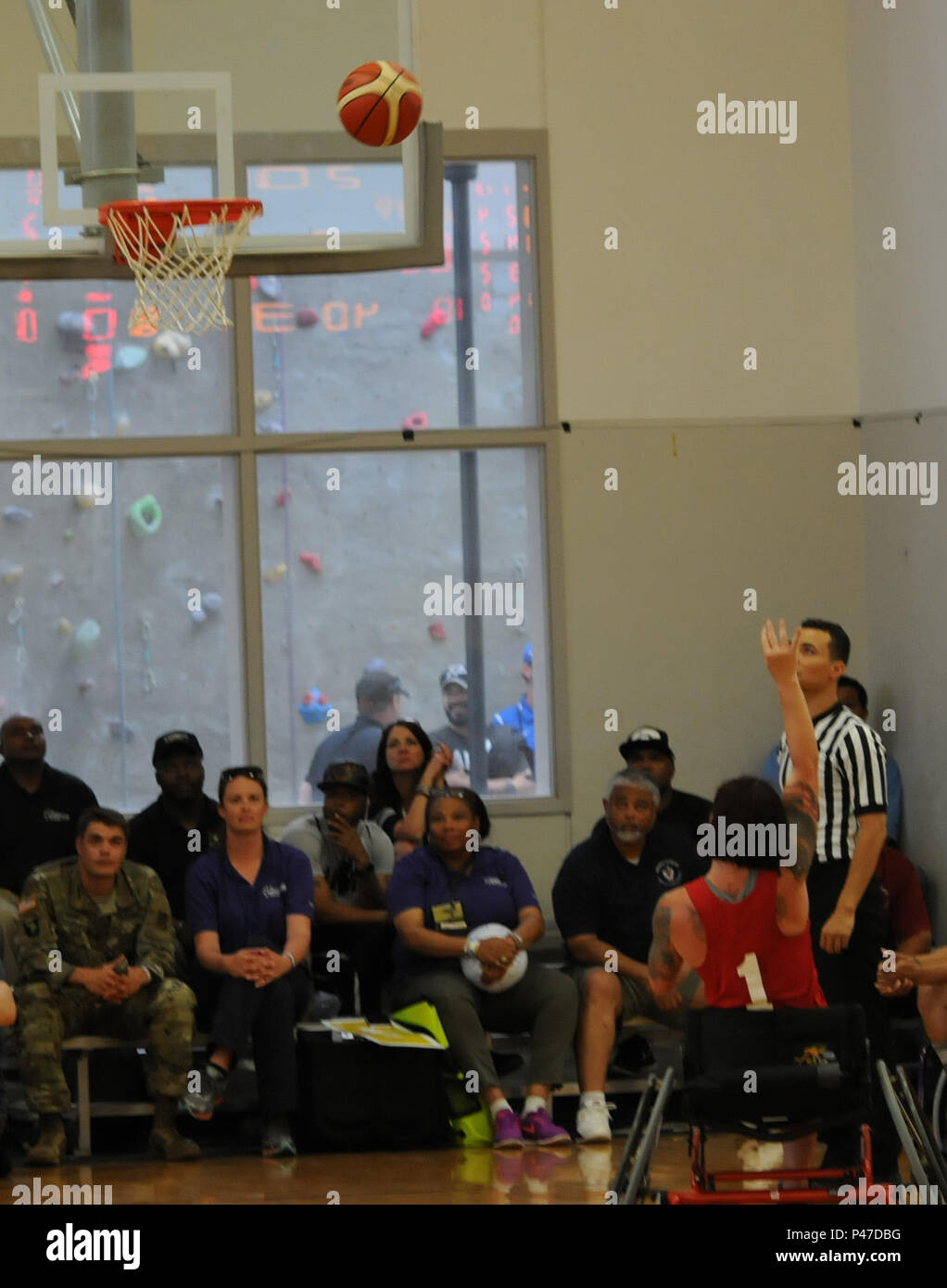 Marine Veteran Sarah Rudder takes a shot during the Wheelchair ...