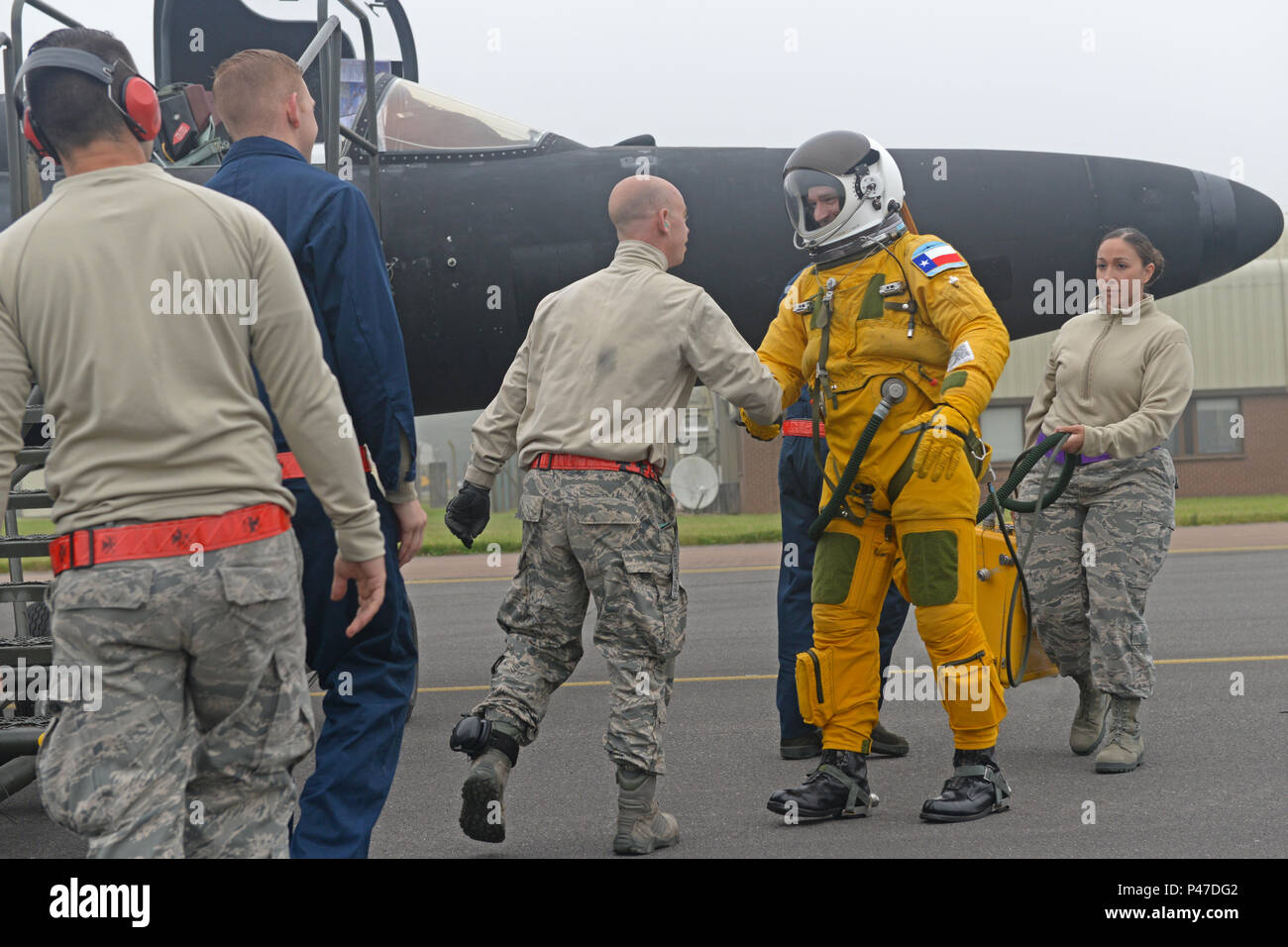 9th Aircraft Maintenance Squadron Airmen shake hands with a U-2 Dragon ...