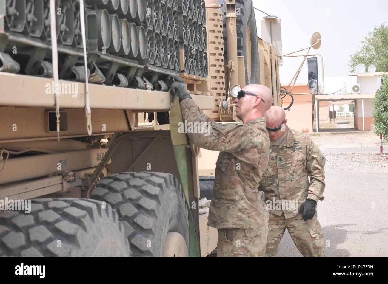 Staff Sgt. Jared Leach, left, and Sgt. Maj. Paul Rick, right, with 1st ...