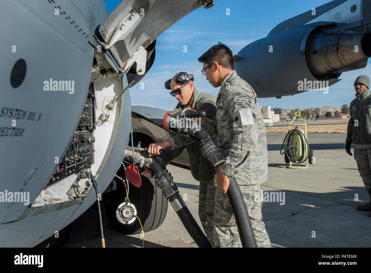 Crew chiefs Airman First Class Kenji Santos and Senior Airman Jacob ...