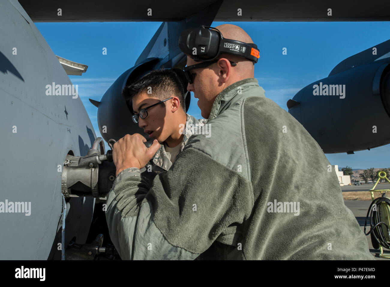 Crew chiefs Airman First Class Kenji Santos and Senior Airman Jacob ...