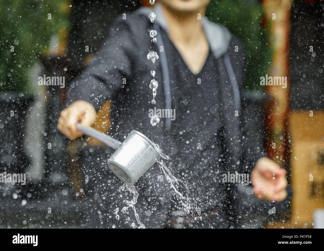 Ritual water purification spring hi-res stock photography and images ...