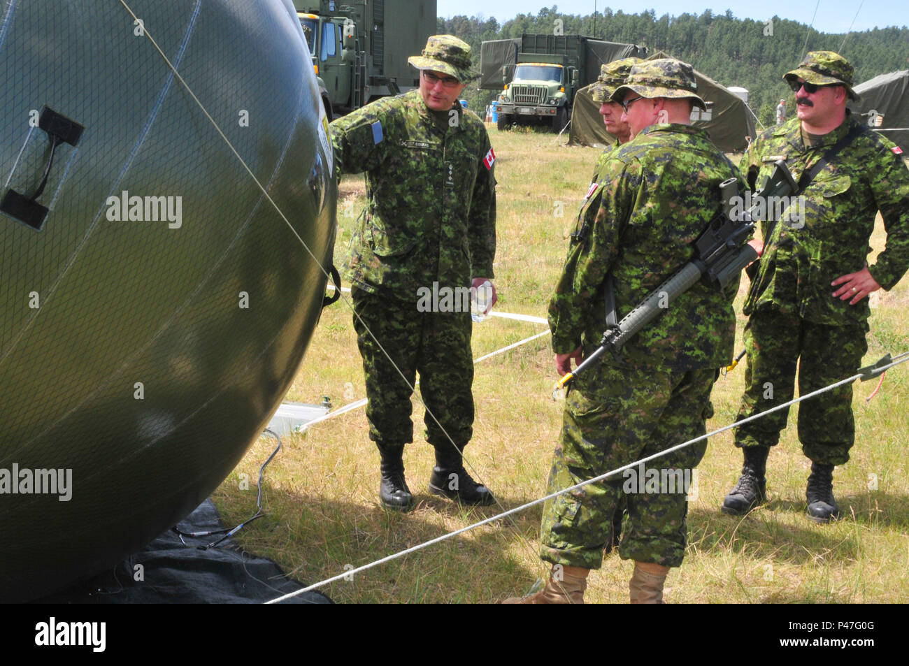 Canadian Army Col. John Conrad, left, commander of the 41 Canadian ...