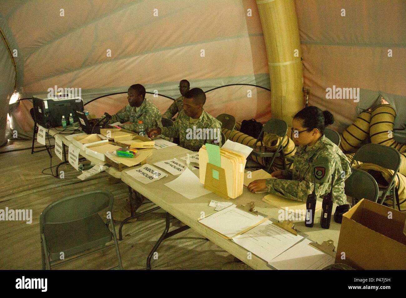 US Army Reserve Soldiers Spc. Breana Lafayette (right), Pfc. Cory Dukes ...