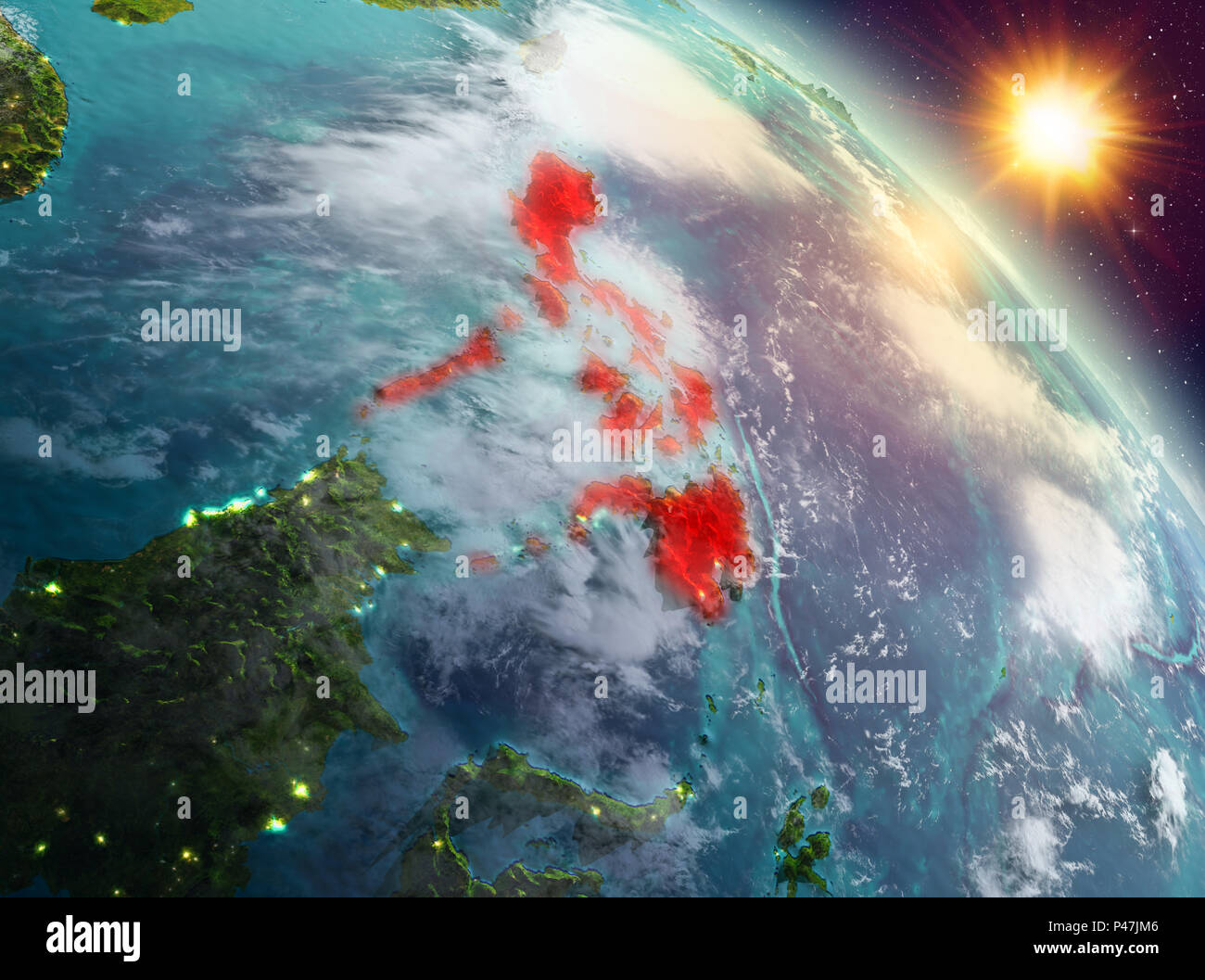 Sunrise above Philippines highlighted in red on model of planet Earth ...