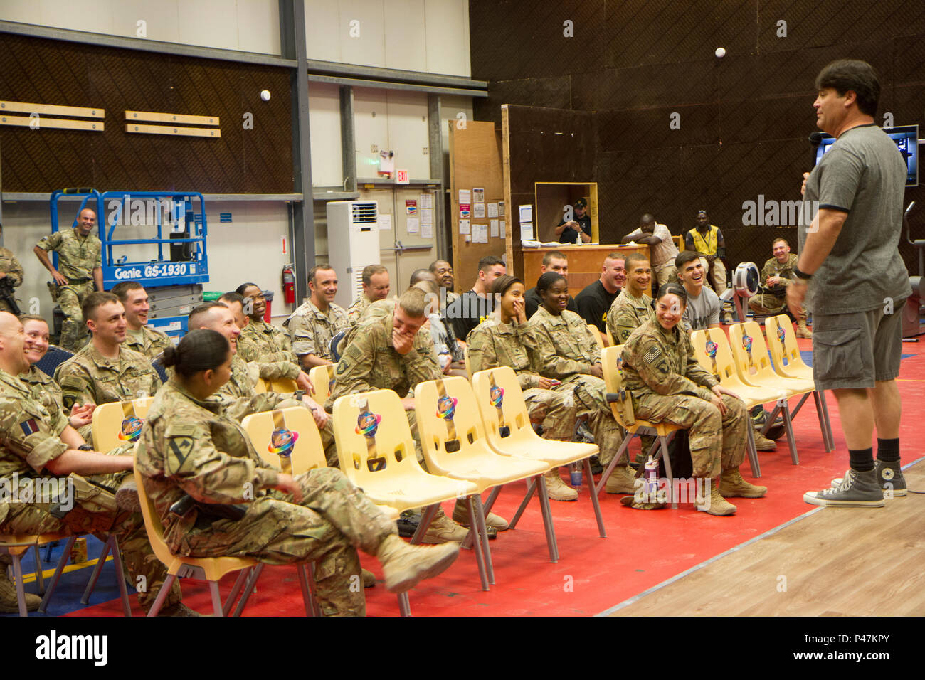 Comedian and former Marine Sam Fedele performs for a group of service ...