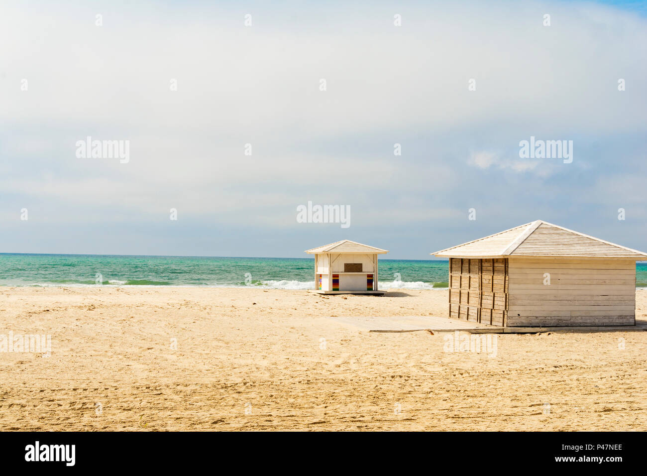 Empty beach. Off season in Black Sea. White beach huts next to the sea ...