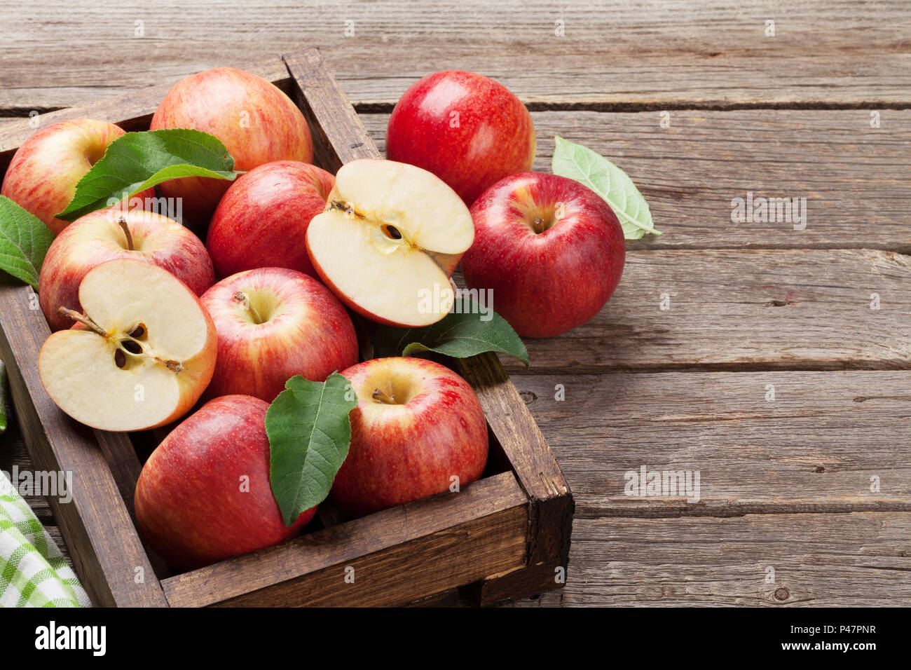 Ripe red apples on wooden table. With space for your text Stock Photo ...