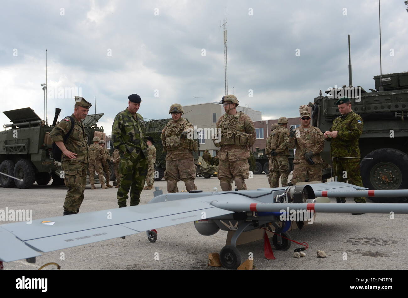 Service members from other countries admire the U.S. Army's RQ-7B ...