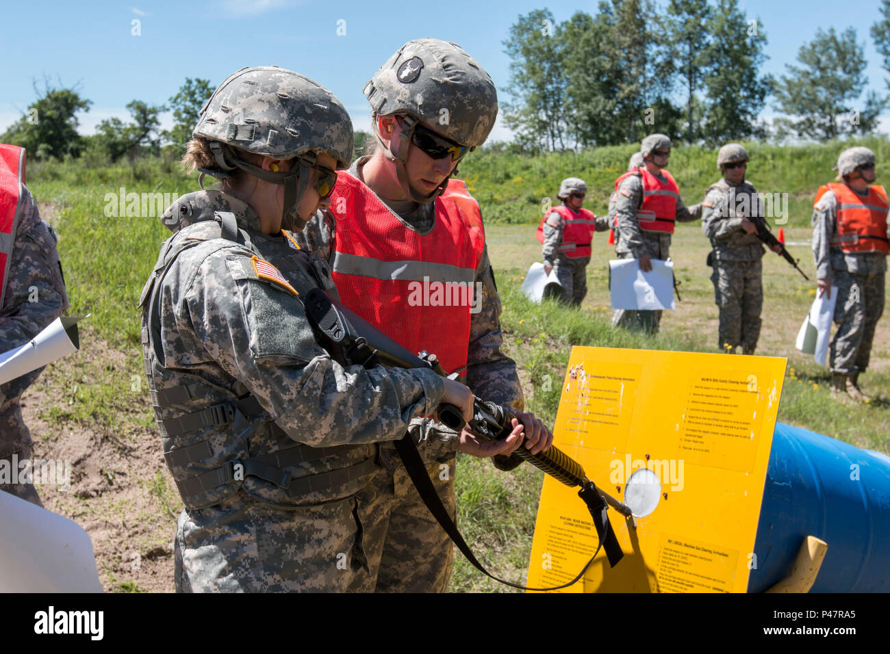 A 834th Aviation Support Battalion Soldier clears her M16 rifle after a ...