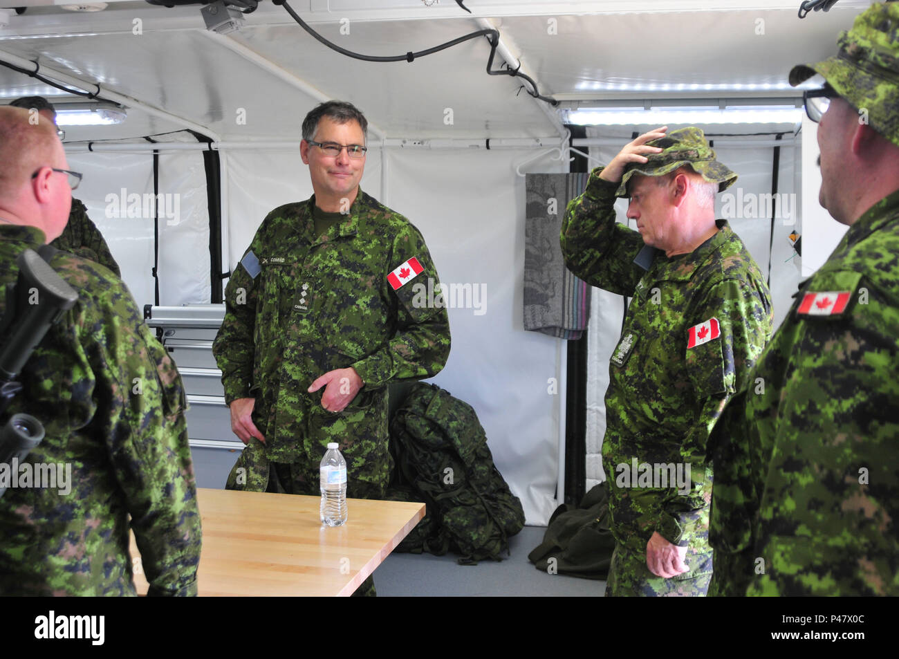 Canadian Army Col. John Conrad and Canadian Army Chief Warrant Officer ...