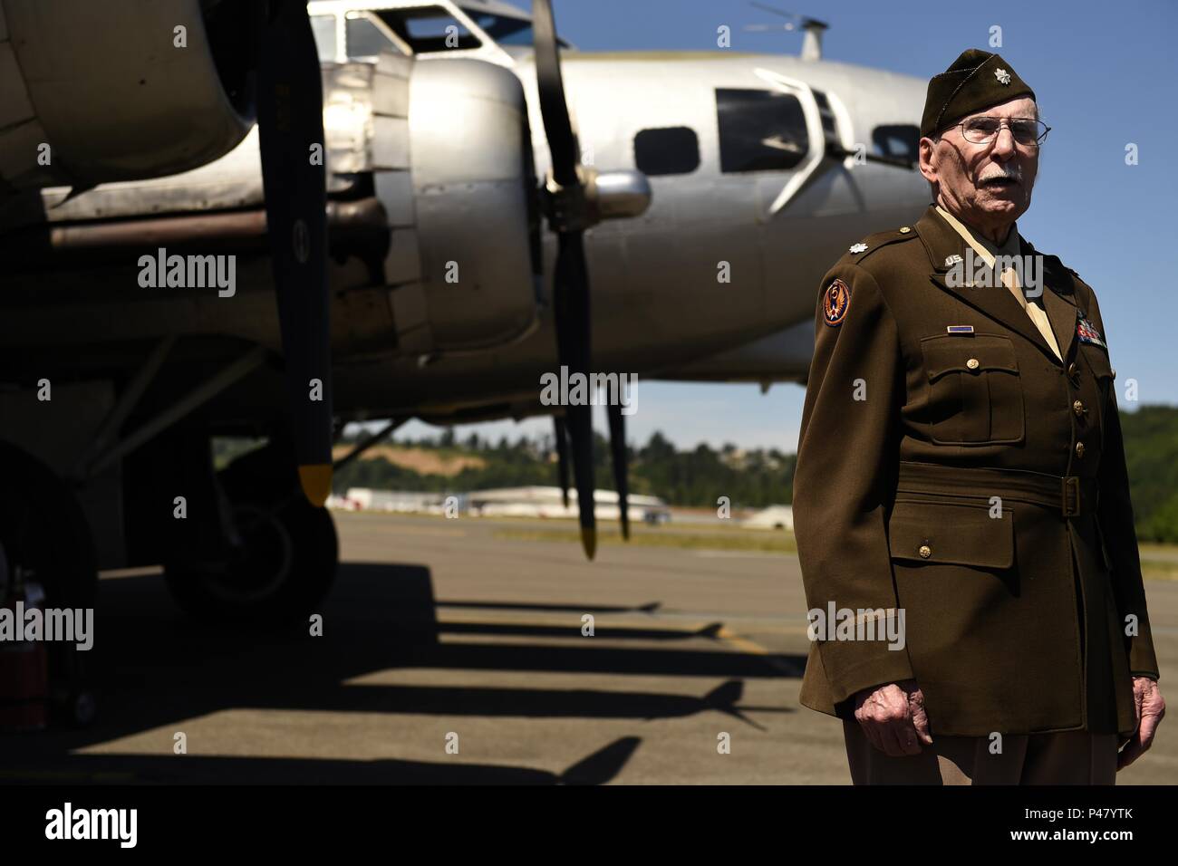 Retired Lt. Col. Ken Wheeler, World War II B-17 navigator, stands in ...
