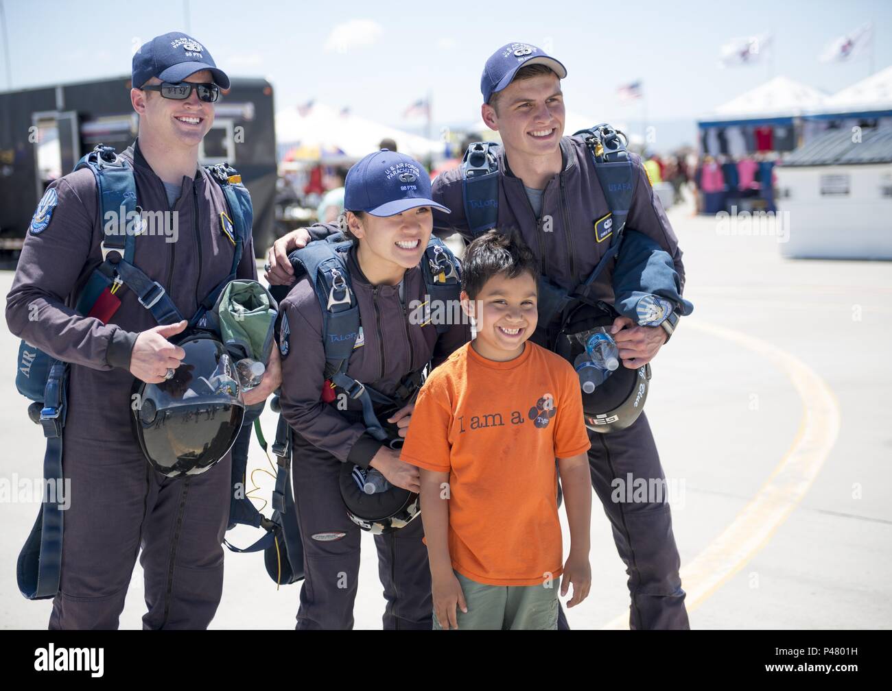 Cadets from the Air Force’s Wings of Blue pose for a photo with a ...