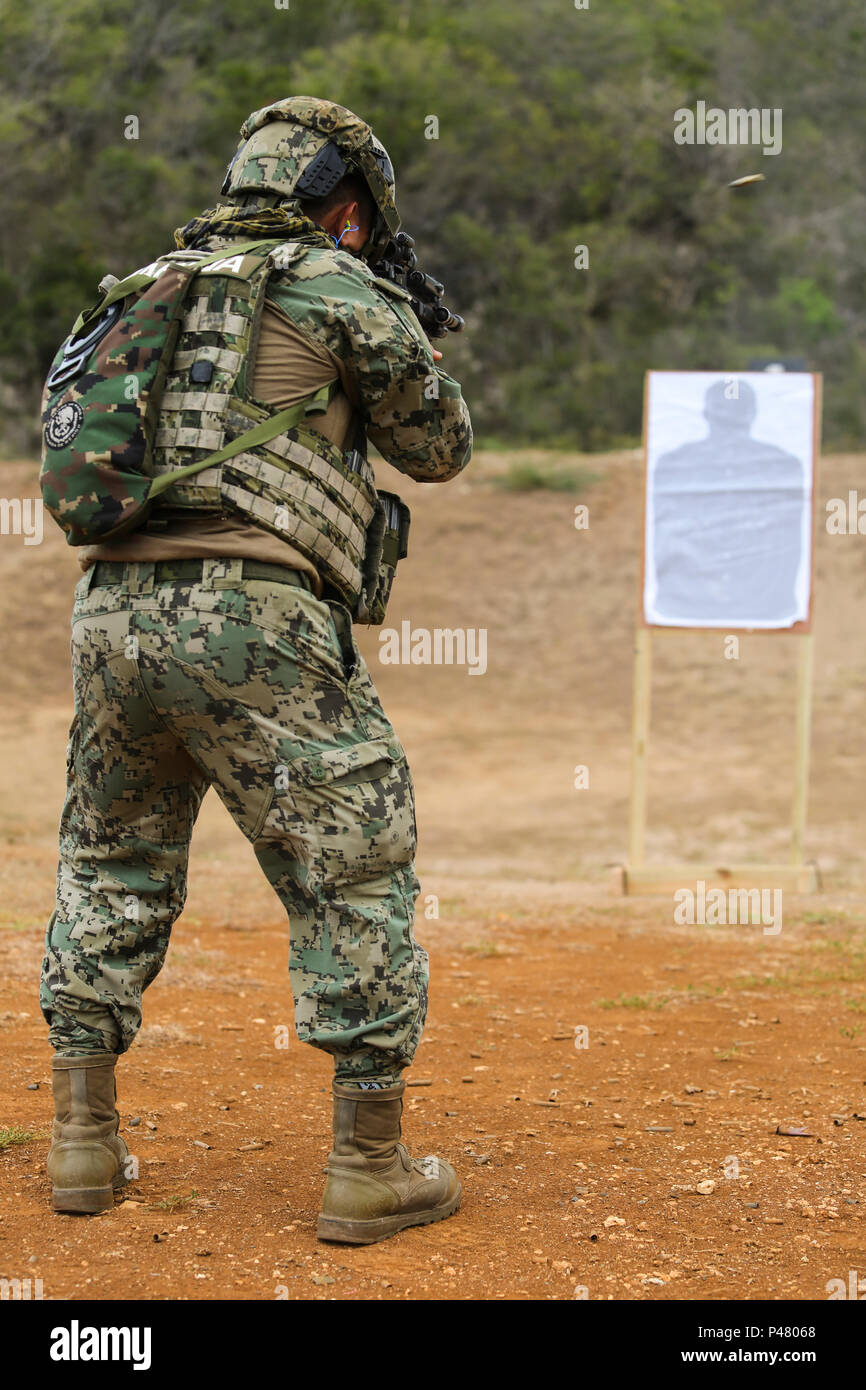 A Mexican Naval Infantry Force Marine engages a target during Exercise ...