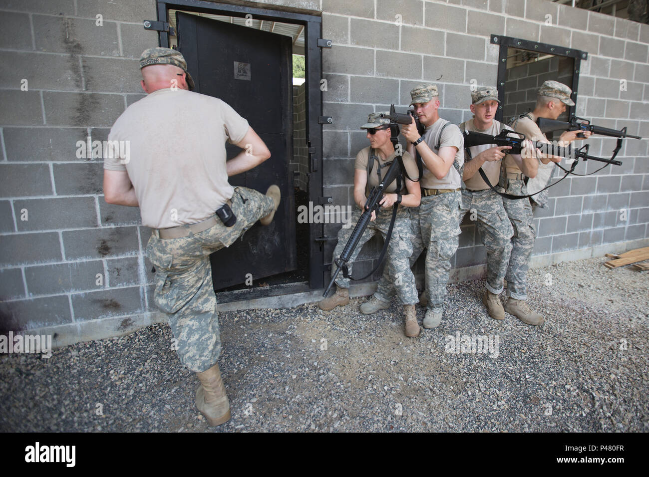 Soldiers clear a room during military operations in urban terrain ...