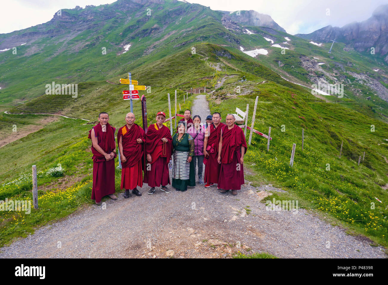Tibetan Buddhist monks in red robes, in Switzerland Stock Photo - Alamy