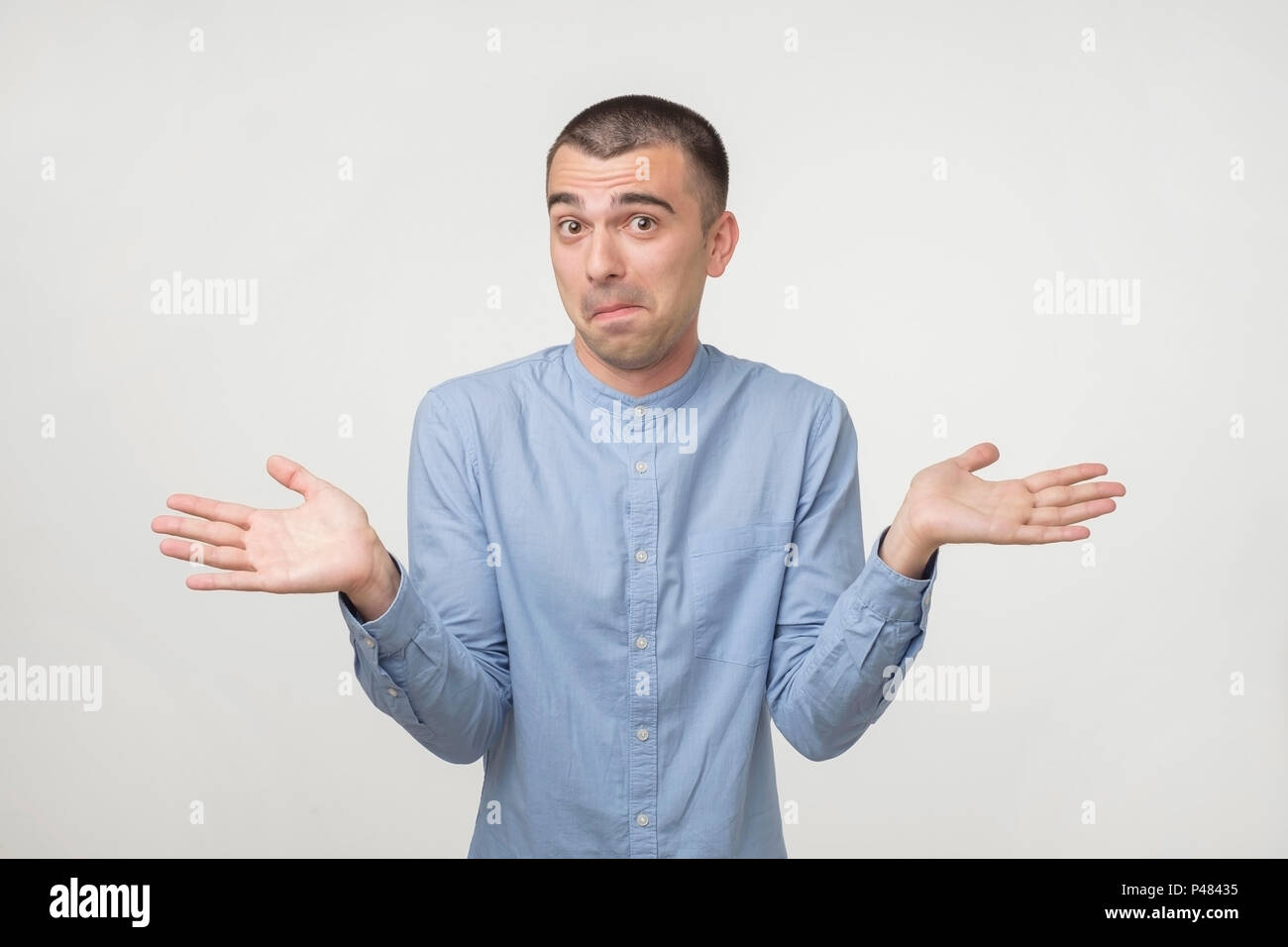 Concept shrug shoulders man hi-res stock photography and images - Alamy
