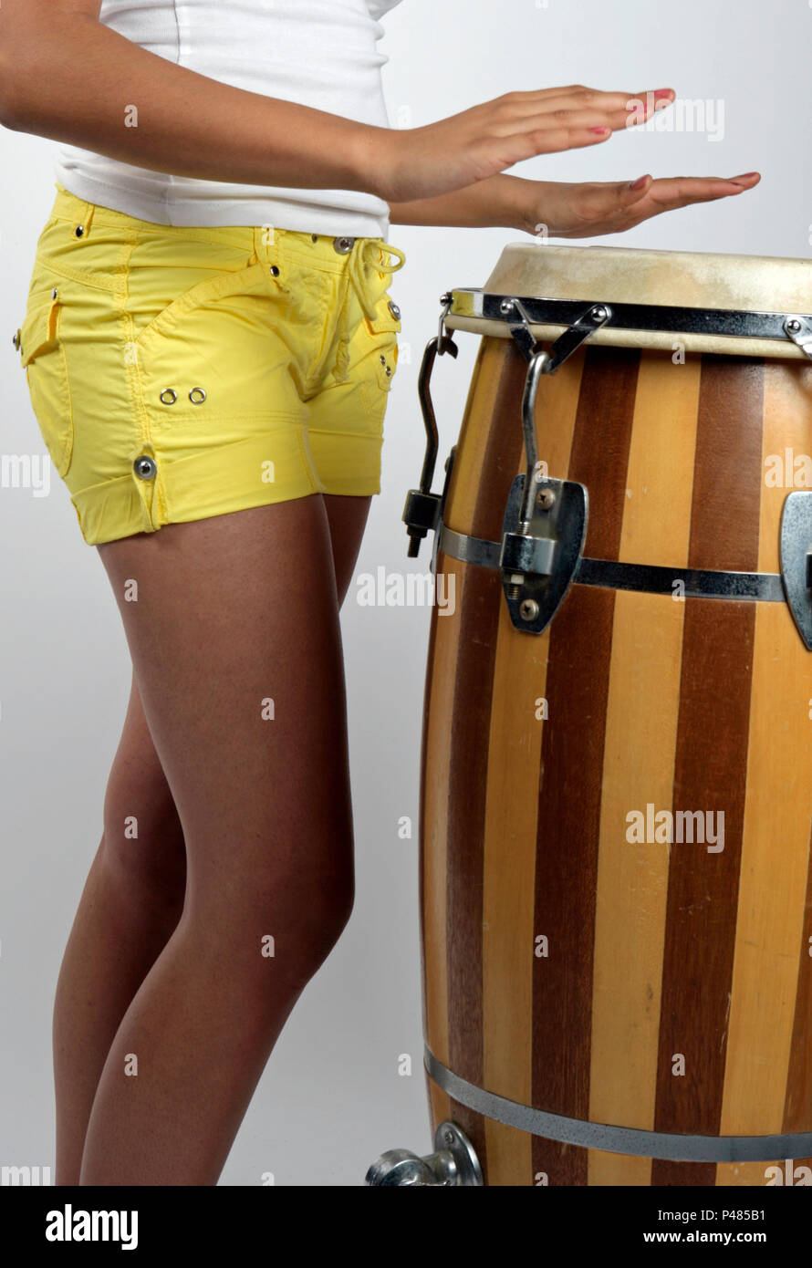 Brazilian girl playing congas Stock Photo - Alamy