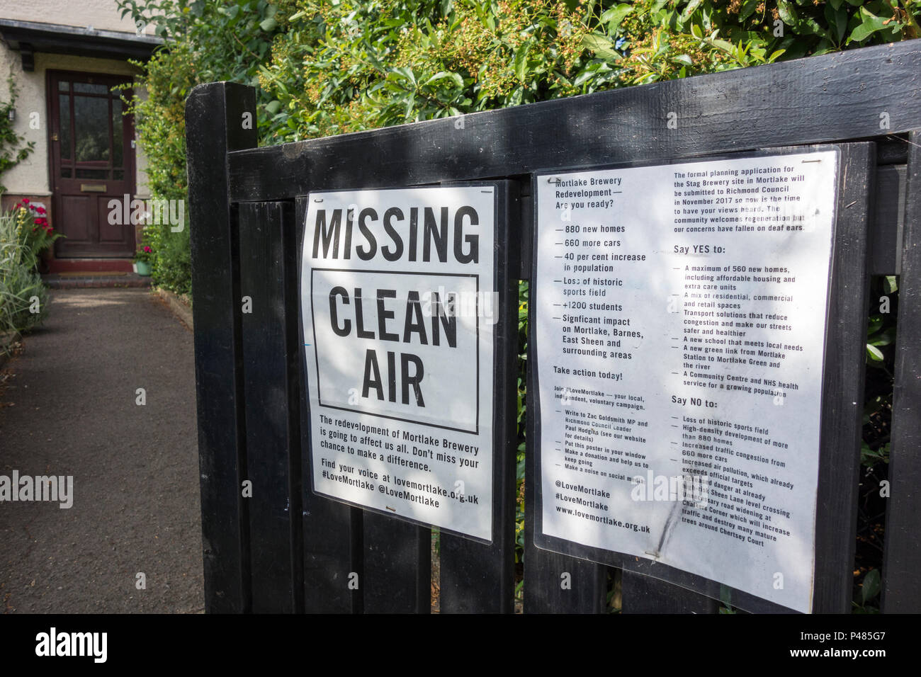 Posters alerting the public to the planned cutting down of trees as ...