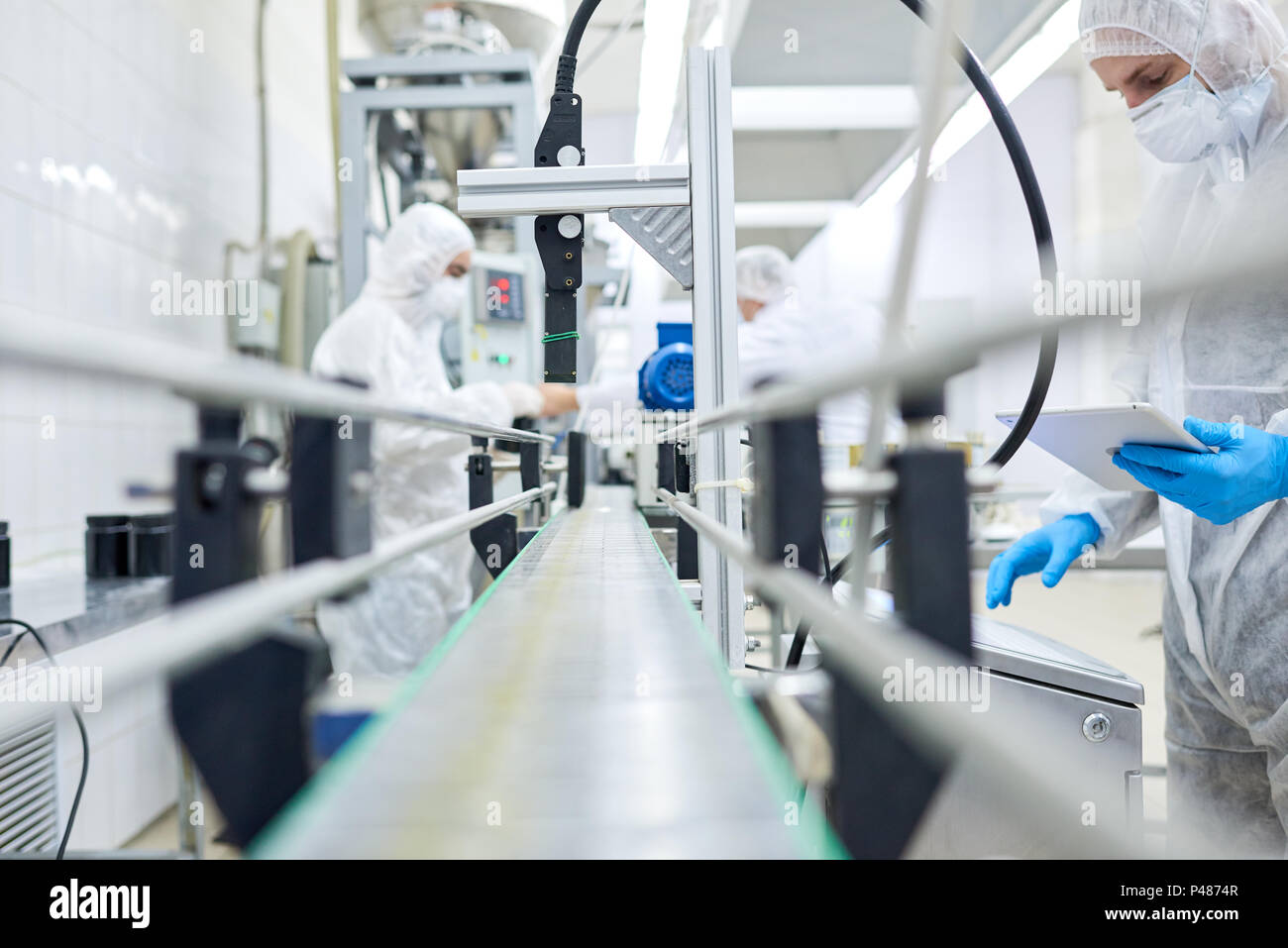 Rubber factory workers hi-res stock photography and images - Alamy