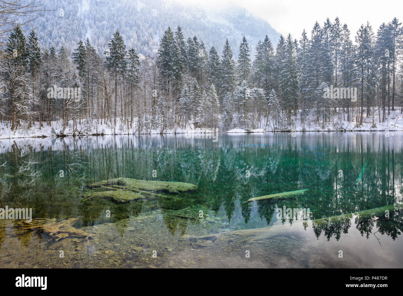 Lake Christlessee in winter at trettach valley near oberstdorf, idyllic ...