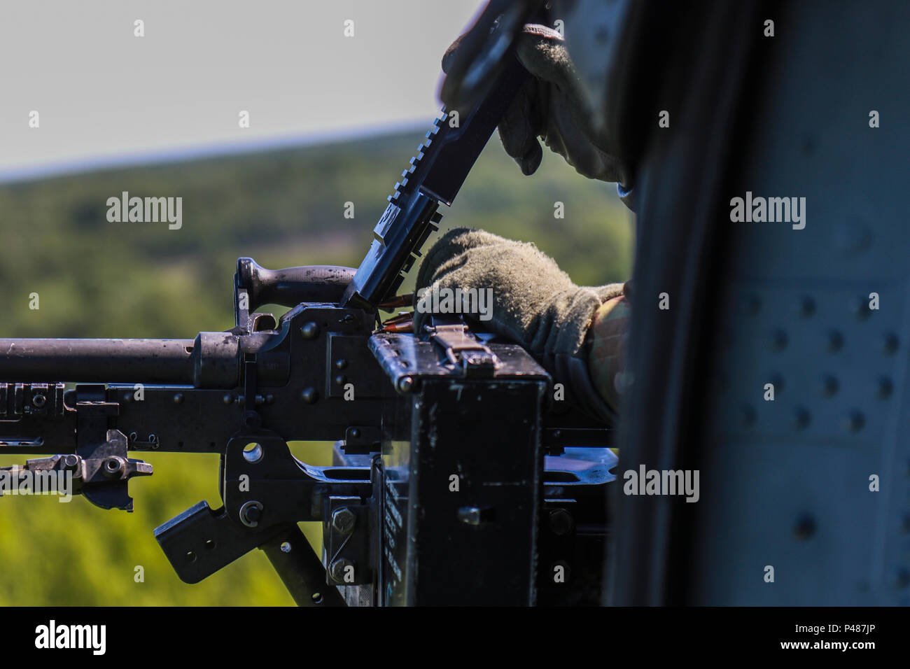 A gunner from 2nd Assault Helicopter Battalion, 82nd Combat Aviation ...