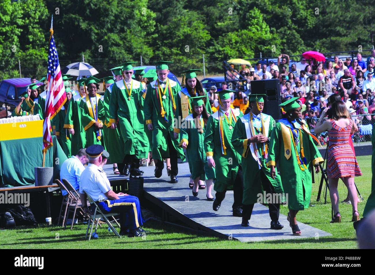 Prince George High School honor graduates walk off the stage after ...