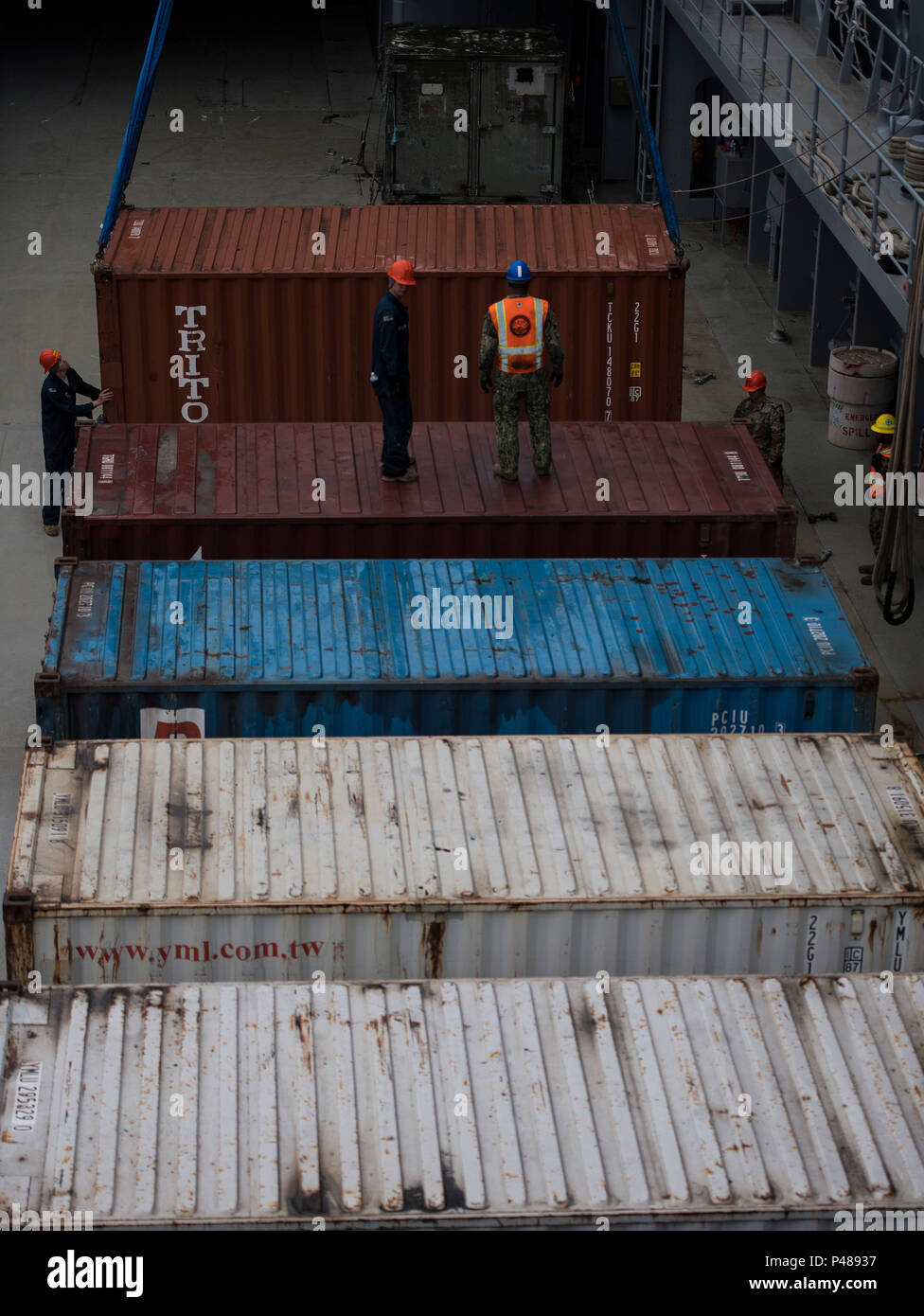 A U.S. Navy sailor assigned to Navy Cargo Handling Battalion 1 from San ...