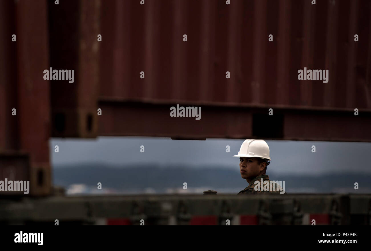 A U.S. Marine assigned to Combat Logistics Battalion 23, Lathrop, Calif ...
